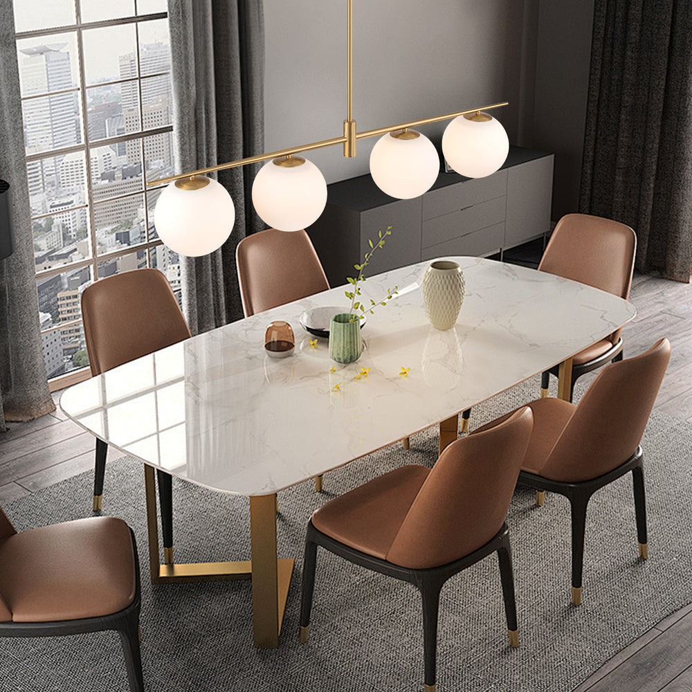 Glowlings 4-Light Modern 45"Wide Opal Glass Globe Brass Linear Pendant